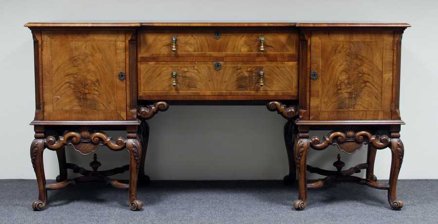Lot 76 - A Queen Anne revival walnut breakfront