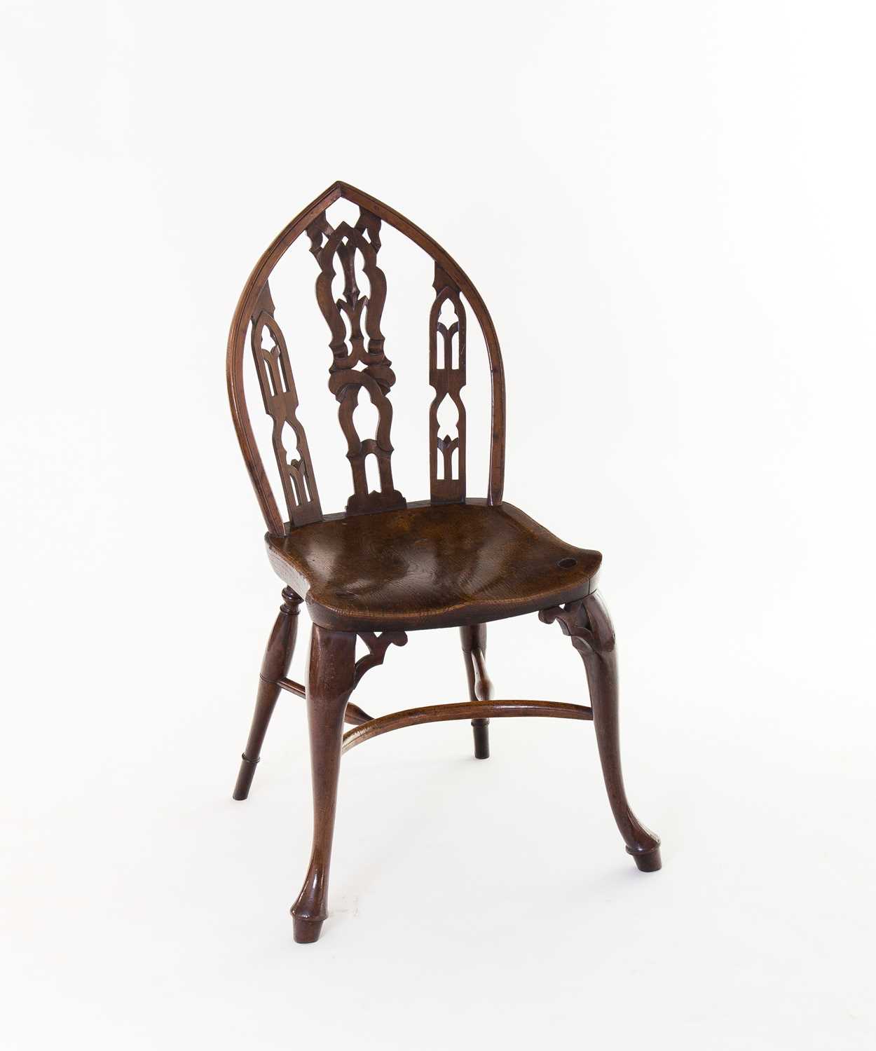 Lot 133 - A fine and rare Gothic Windsor chair in yew