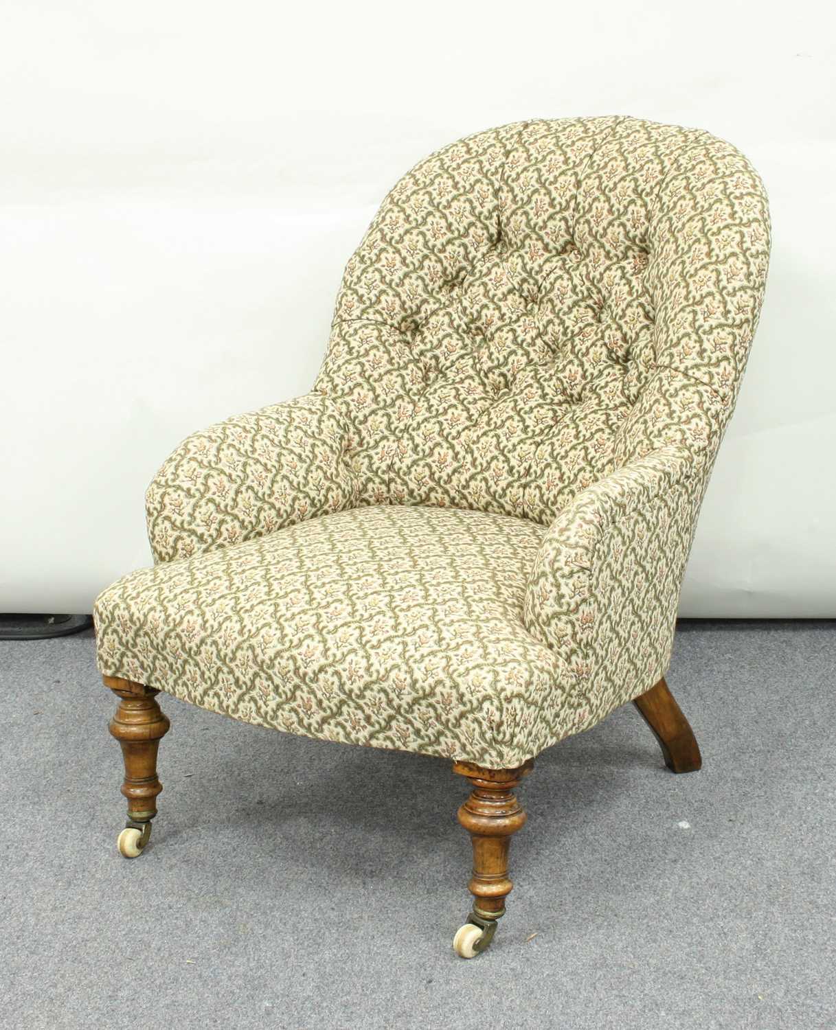 Lot 238 - A Victorian button back chair on turned