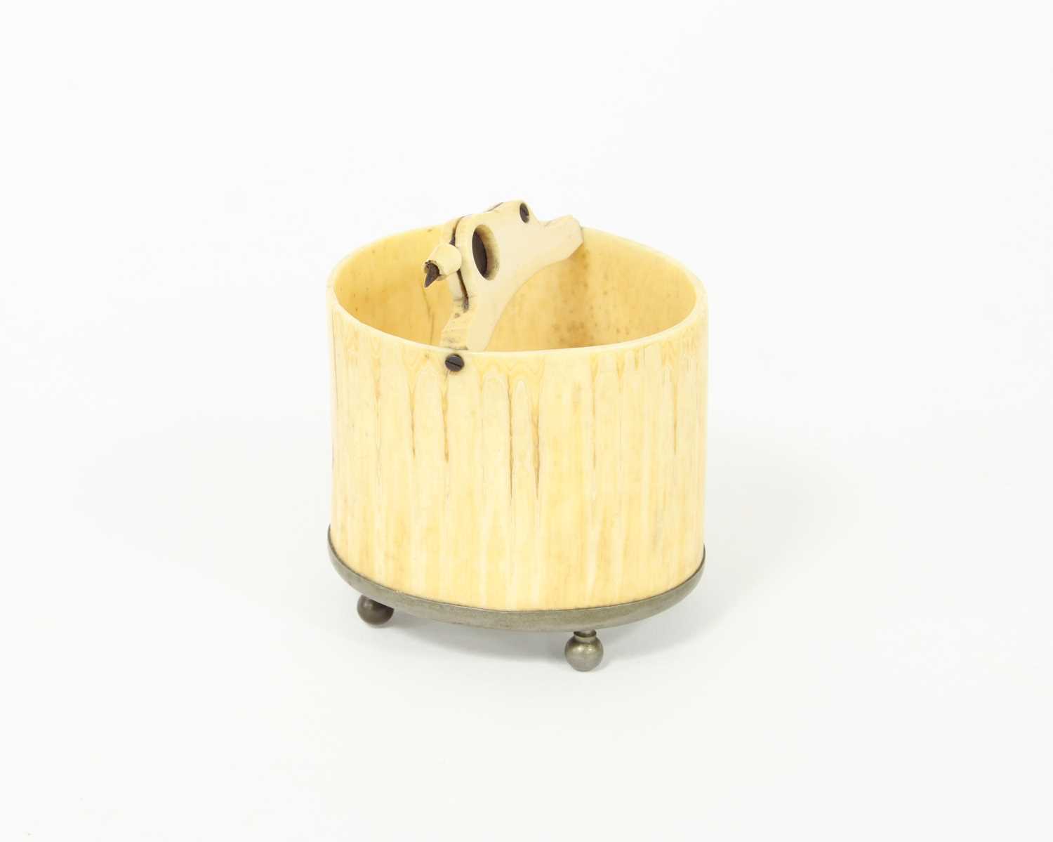 Lot 337 - An ivory and white metal cheroot cutter and