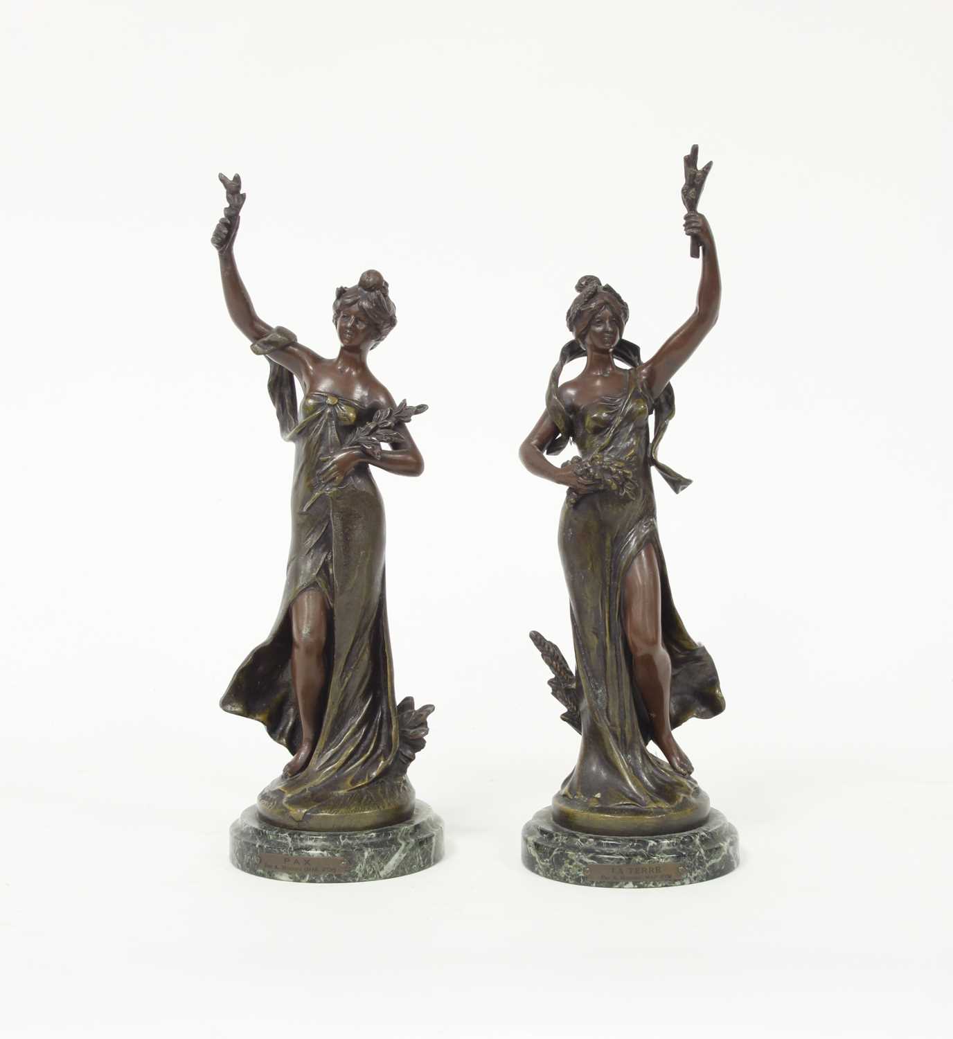Lot 405 - A pair of spelter figures, after Auguste