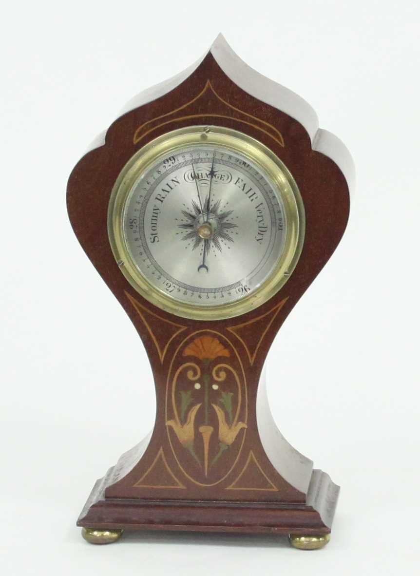 Lot 229 - An Edwardian barometer in an inlaid balloon