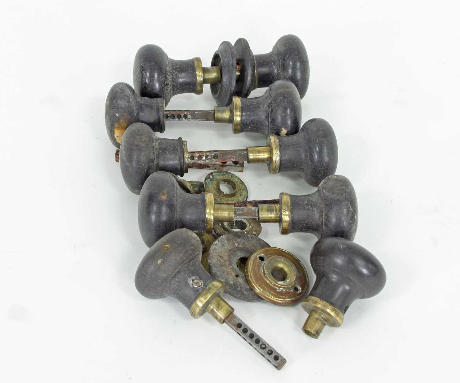 Lot 261 - Five Edwardian turned wood door knobs, bars