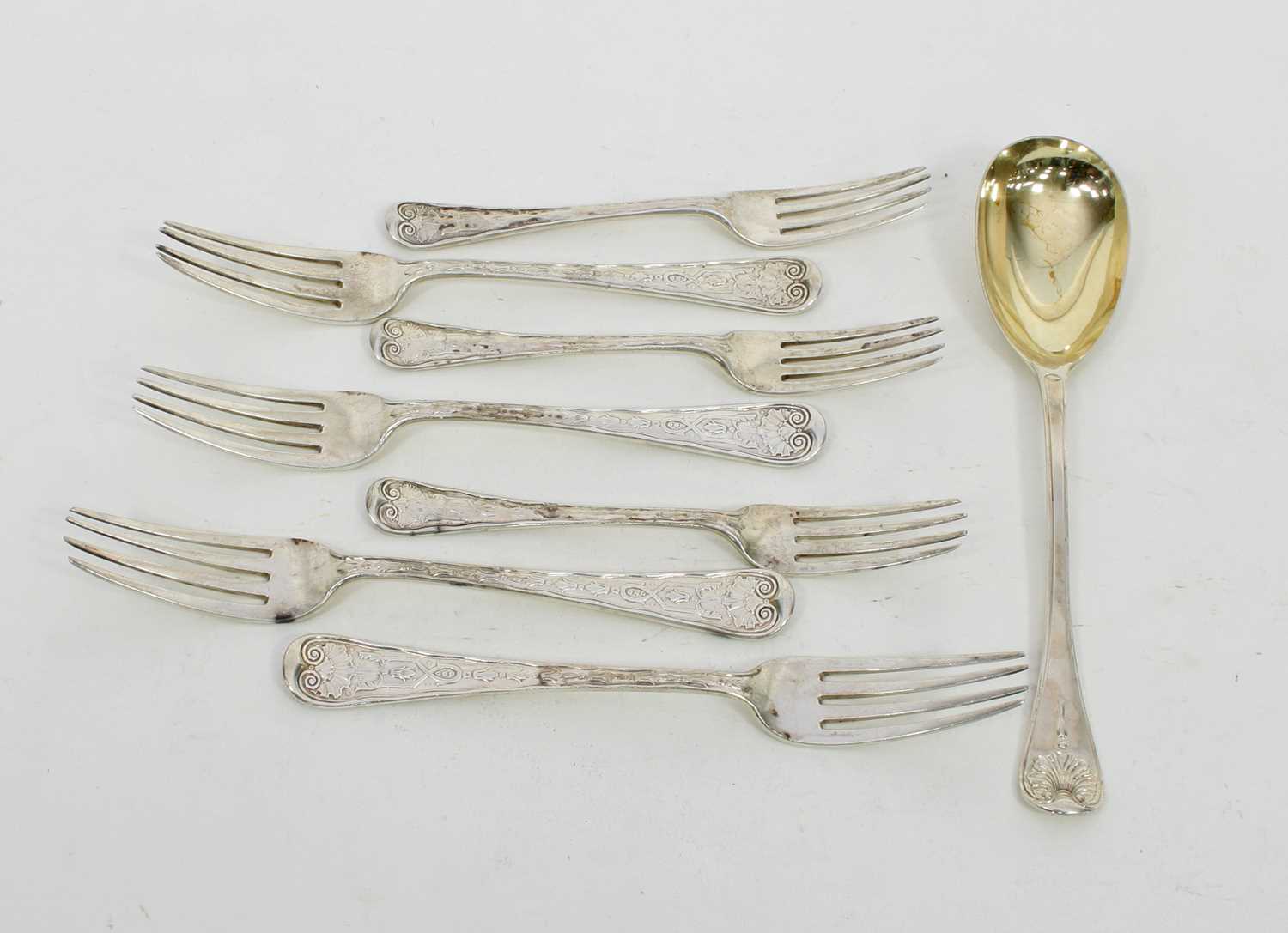 Lot 645 - Four Victorian silver table forks and three