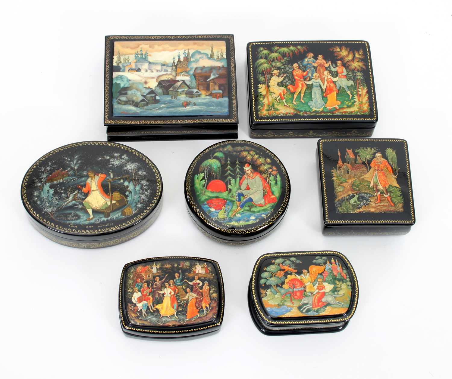 Lot 80 - A group of seven Russian Palekh boxes,