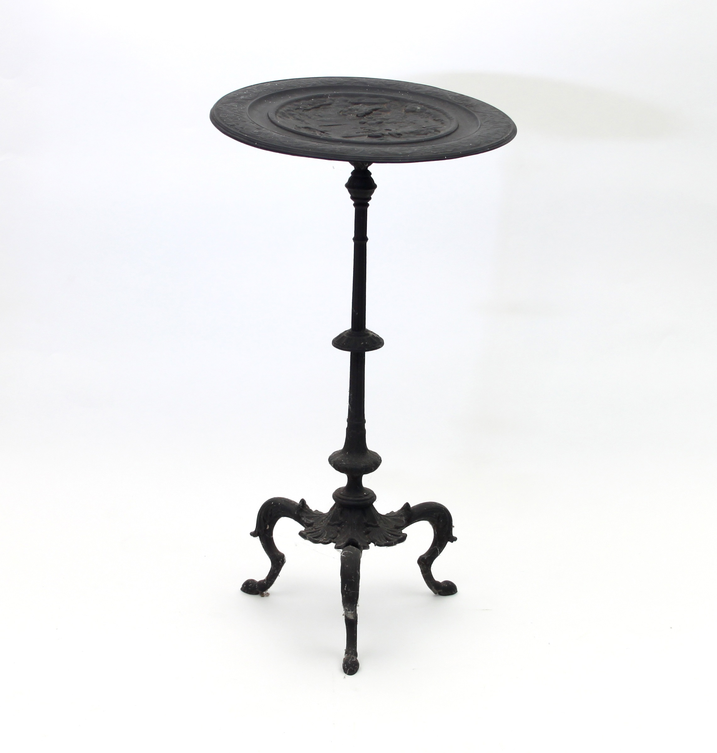 Lot 241 - A circular cast iron garden table, the top