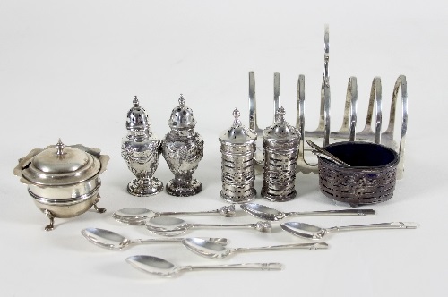 Lot 80 - A pair of Edwardian silver pepperettes,