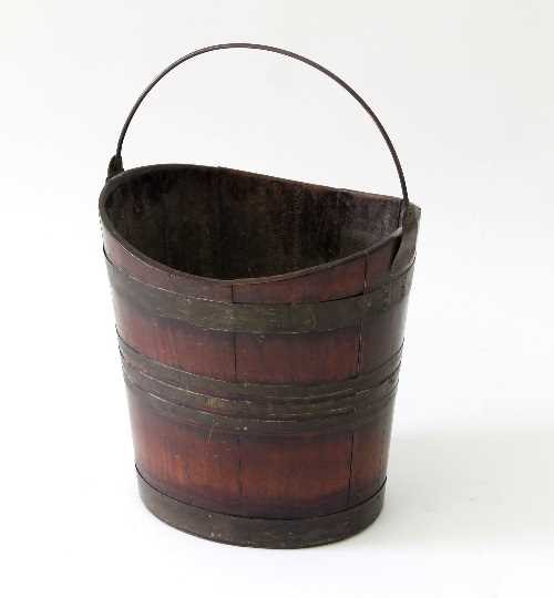 Lot 176 - A brass bound oval coal pail with swing