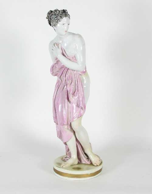 Lot 231 - An Italian glazed figure of a semi-clad
