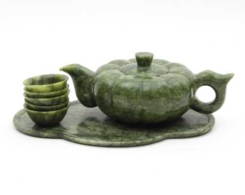 Lot 487 - A Chinese carved jadeite tea set, comprising