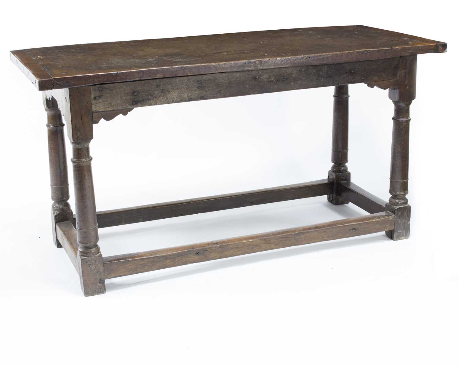 Lot 761 - A small oak refectory type table, the plank