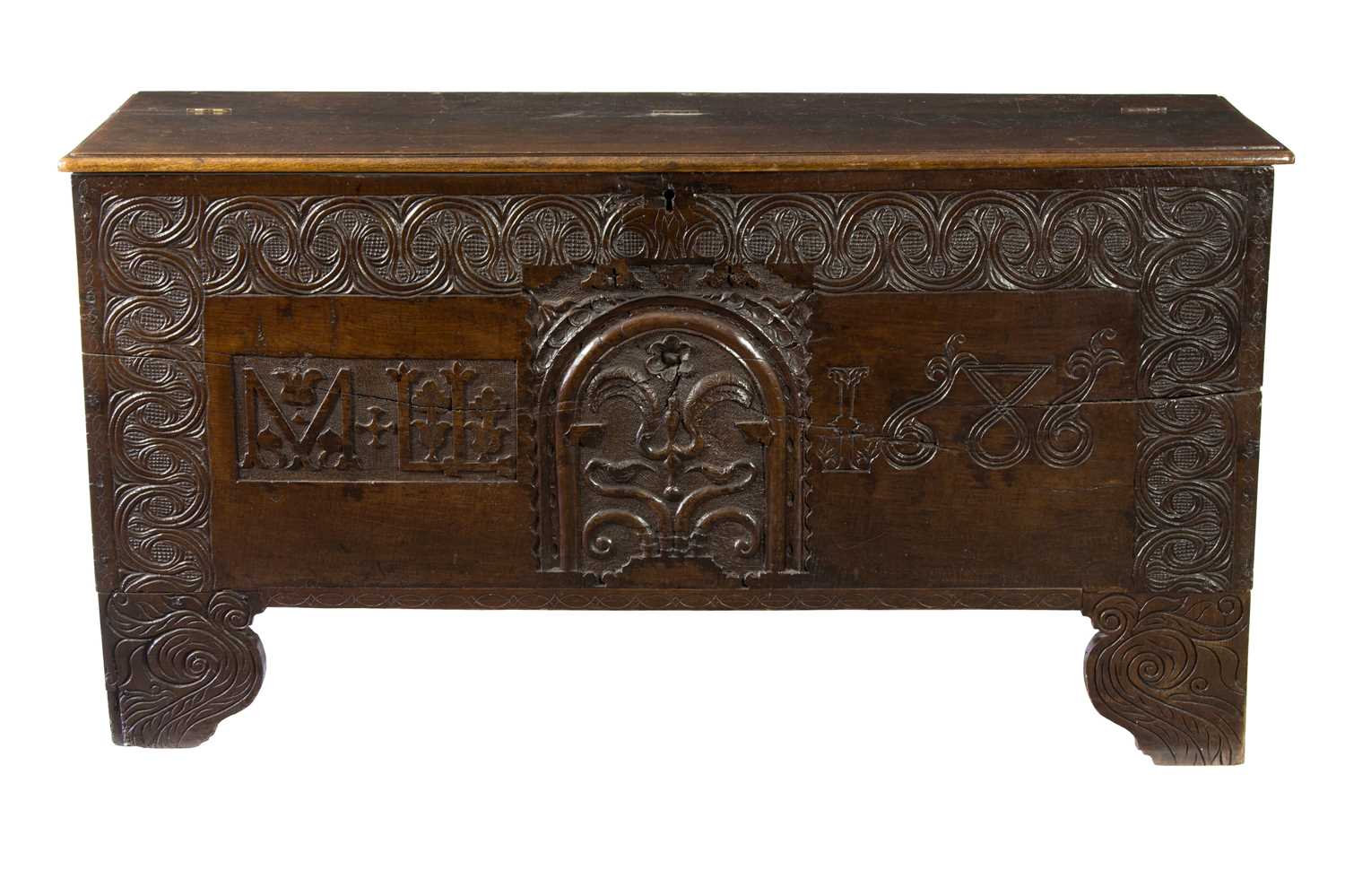 Lot 772 - A James II carved oak chest, the later