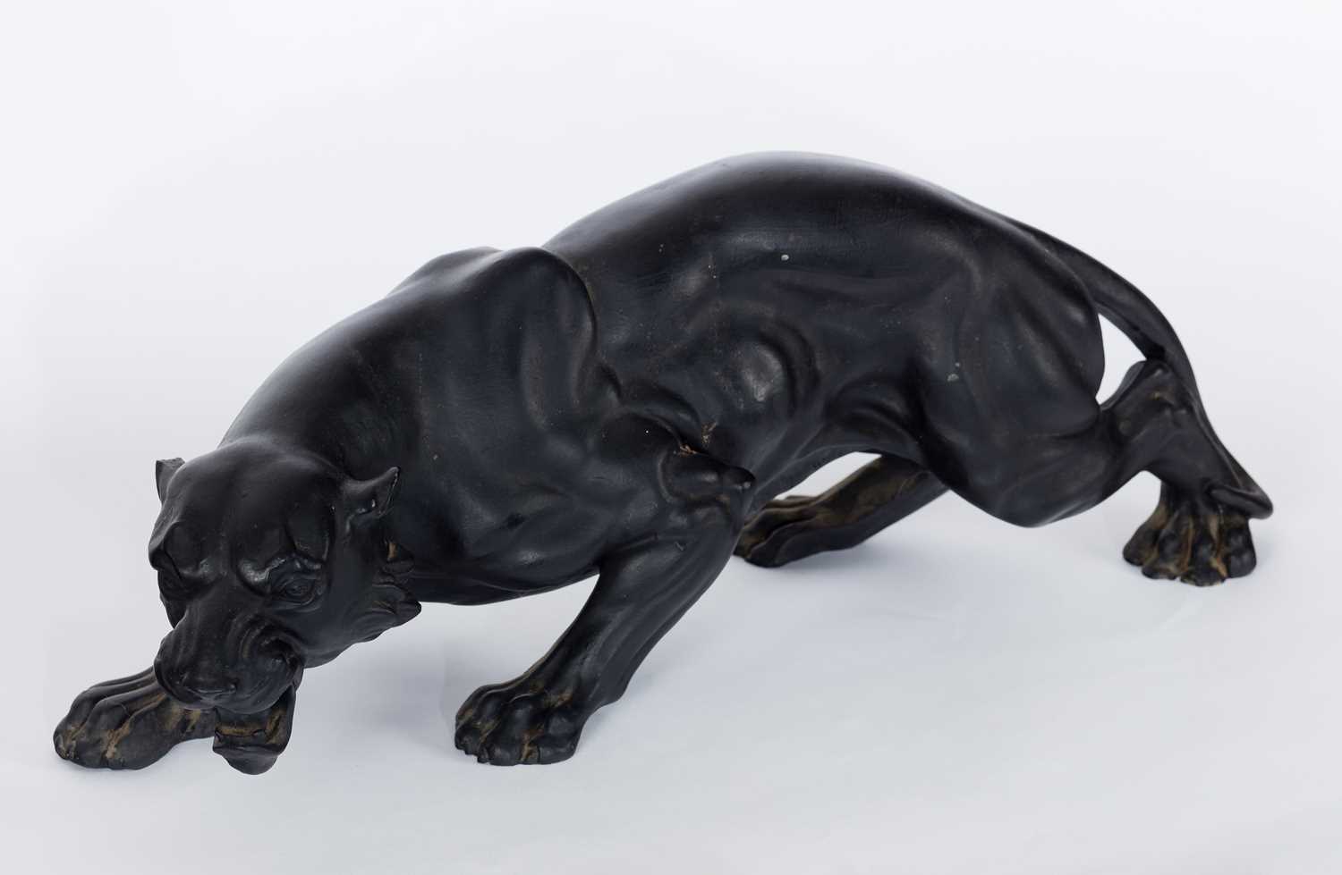 Lot 353 - A carved model of a panther, carved from