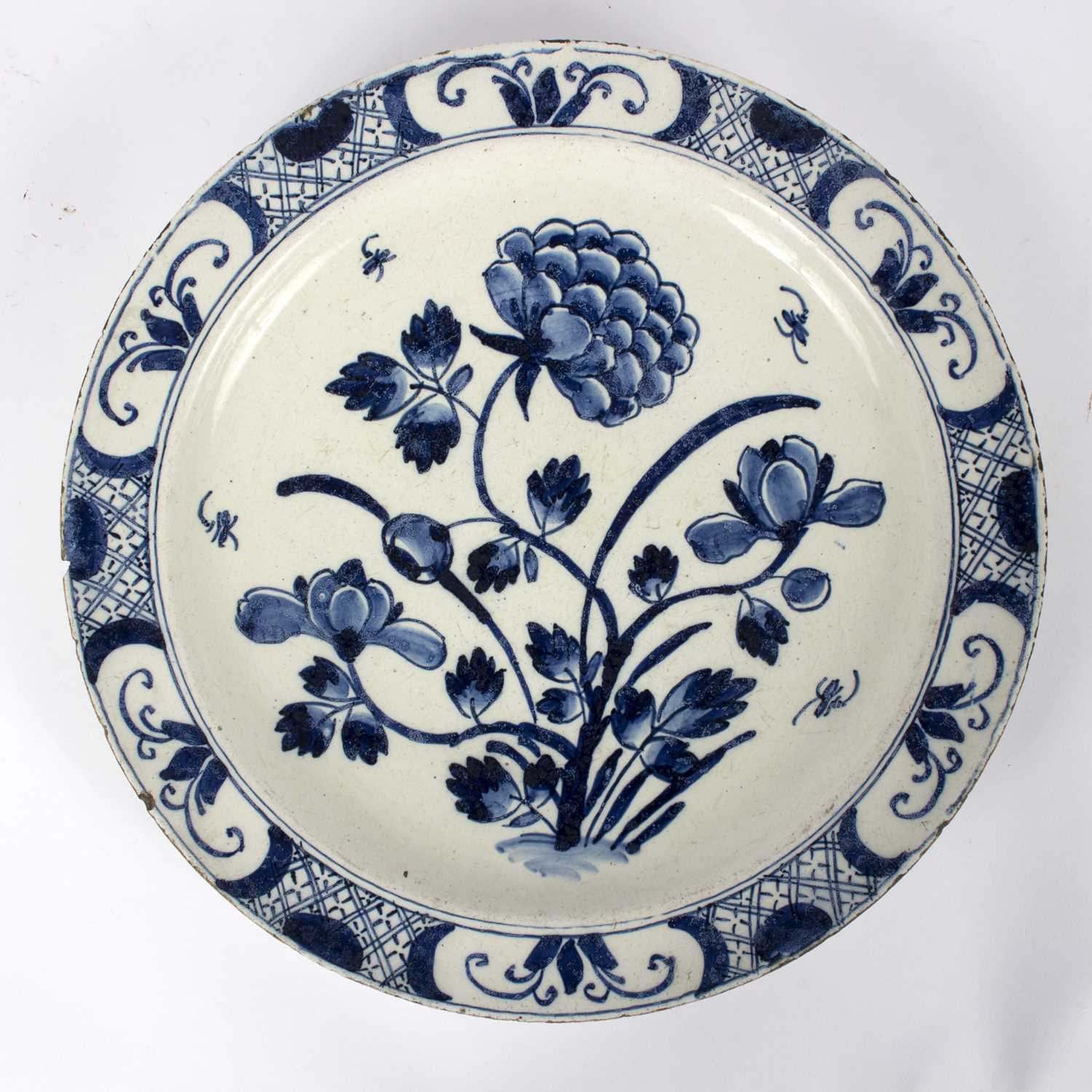 Lot 260 - A Dutch delft charger, 35.5cm diameter