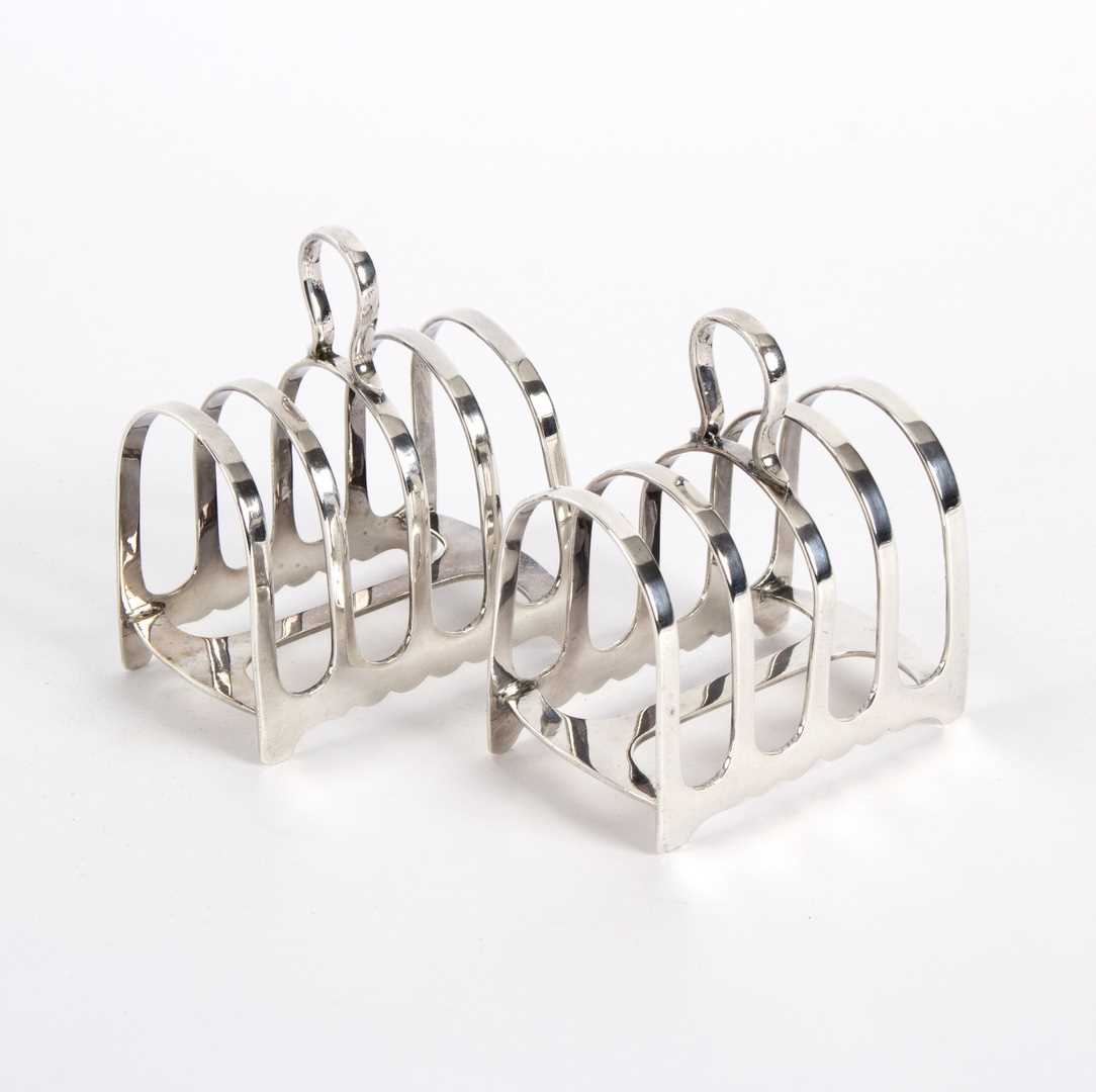 Lot 9 - A pair of silver toast racks, James Dixon
