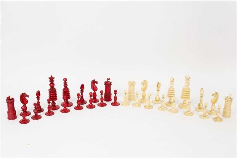 Lot 147 - A 19th Century ivory and red stained ivory