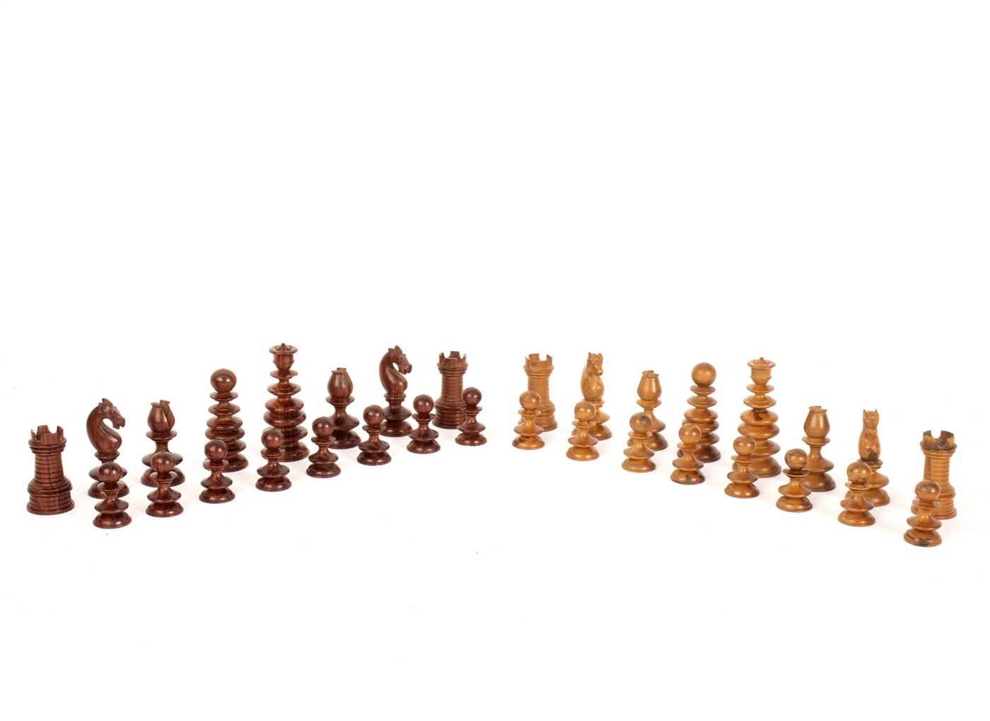 Lot 395 - A turned wood chess set of bobbin form, the