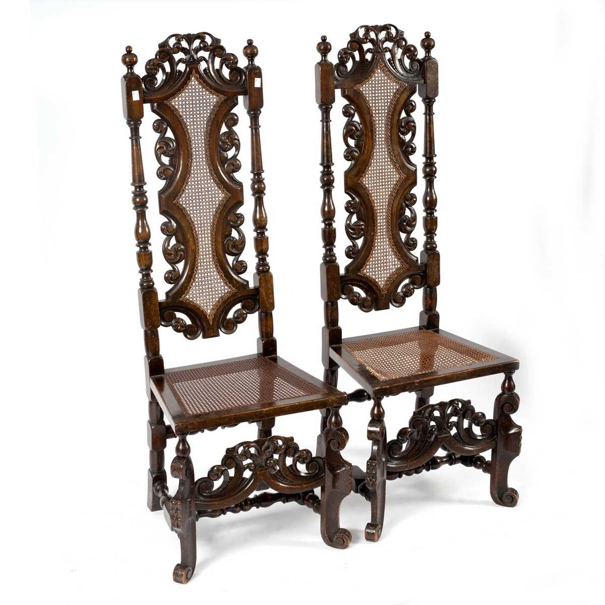 Lot 91 - A pair of high back chairs of Carolean design
