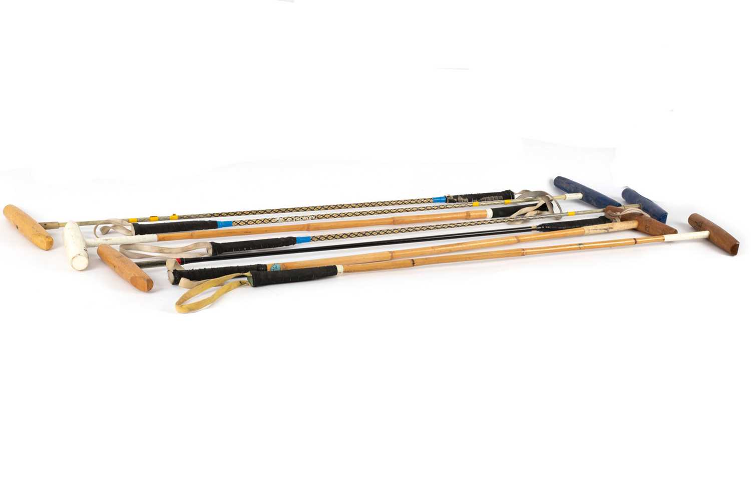 Lot 127 - Seven polo sticks, various