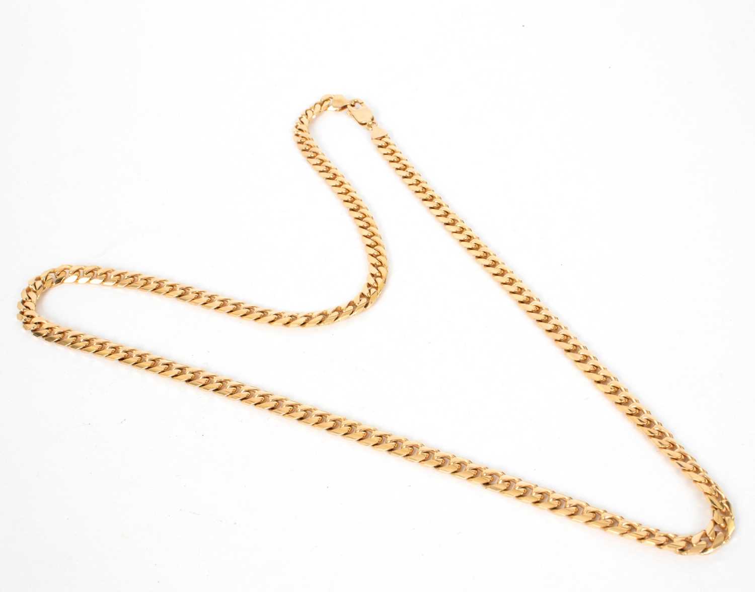 Lot 738 - A 9ct yellow gold necklace of flattened curb