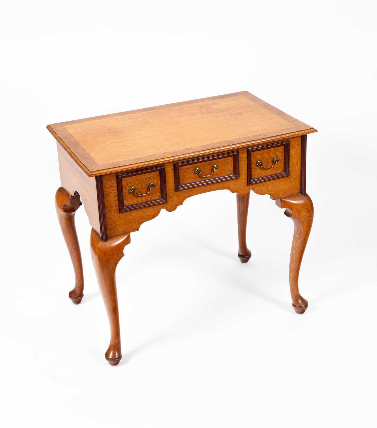 Lot 361 - A 20th Century oak and walnut side table