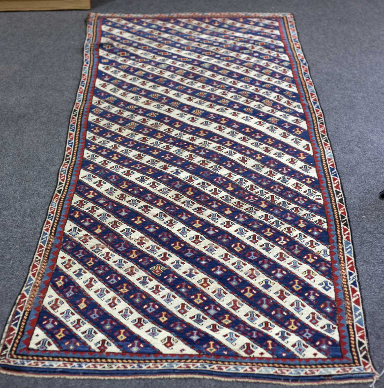 Lot 891 - A Kuba long rug, East Caucasus, circa 1890,