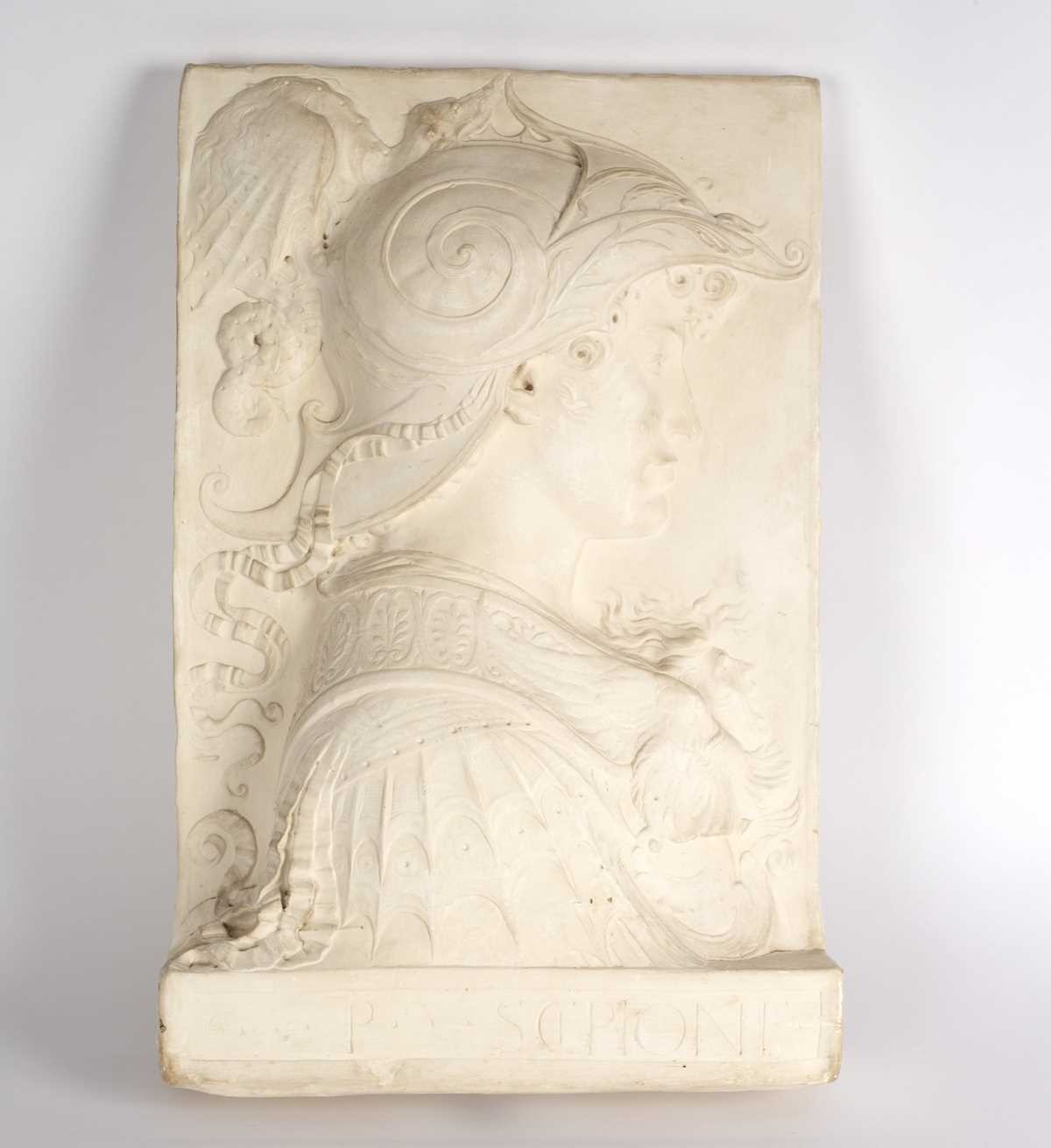 Lot 370 - A plaster relief bust, of a helmeted youth,