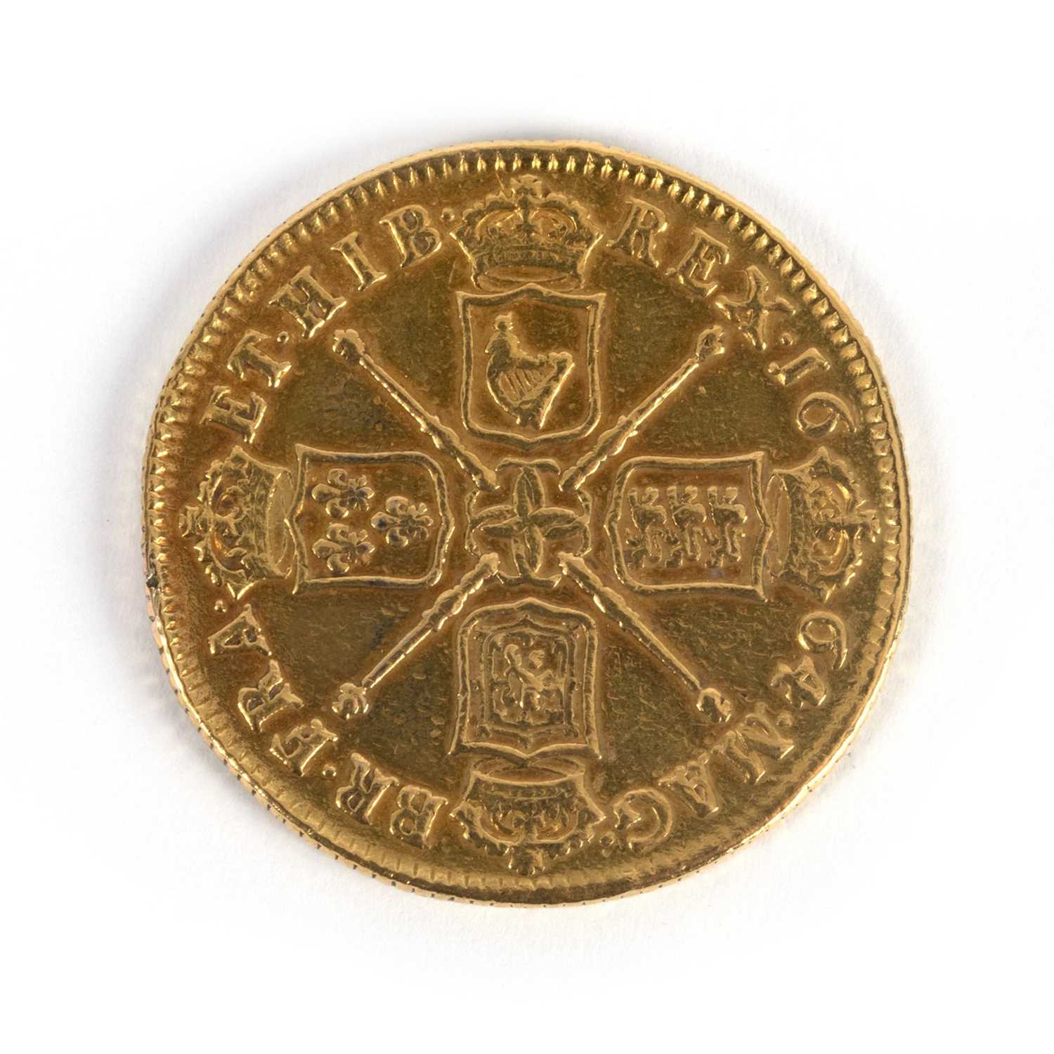 Lot 71 - A Charles II gold two guinea coin, 1664, bust