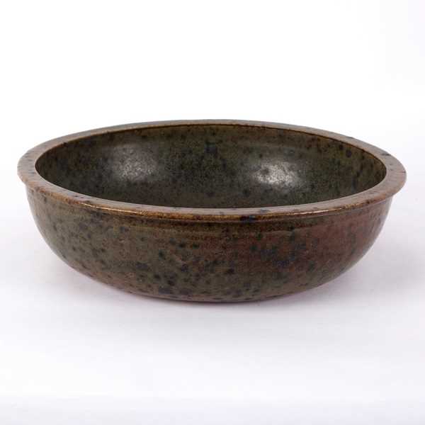 Lot 180 - A Studio Pottery large shallow bowl with