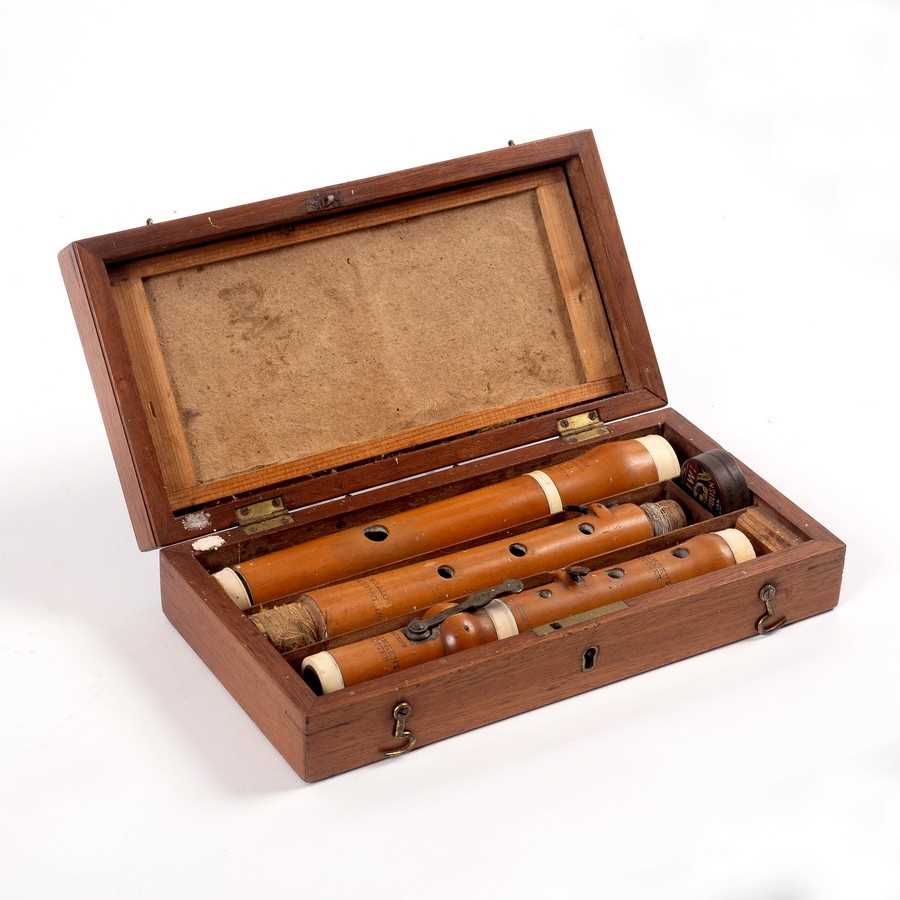 Lot 583 - A boxwood ivory mounted three-section flute