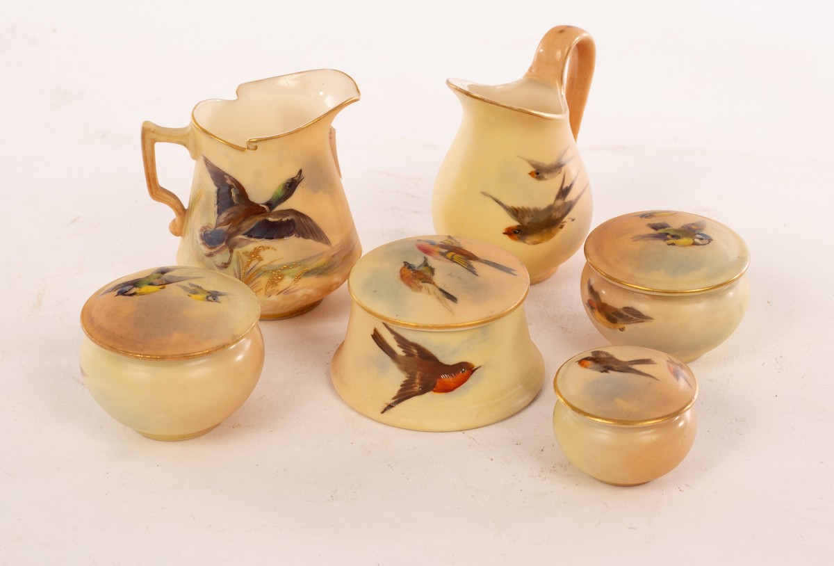 Lot 27 - Four Royal Worcester miniature lidded boxes