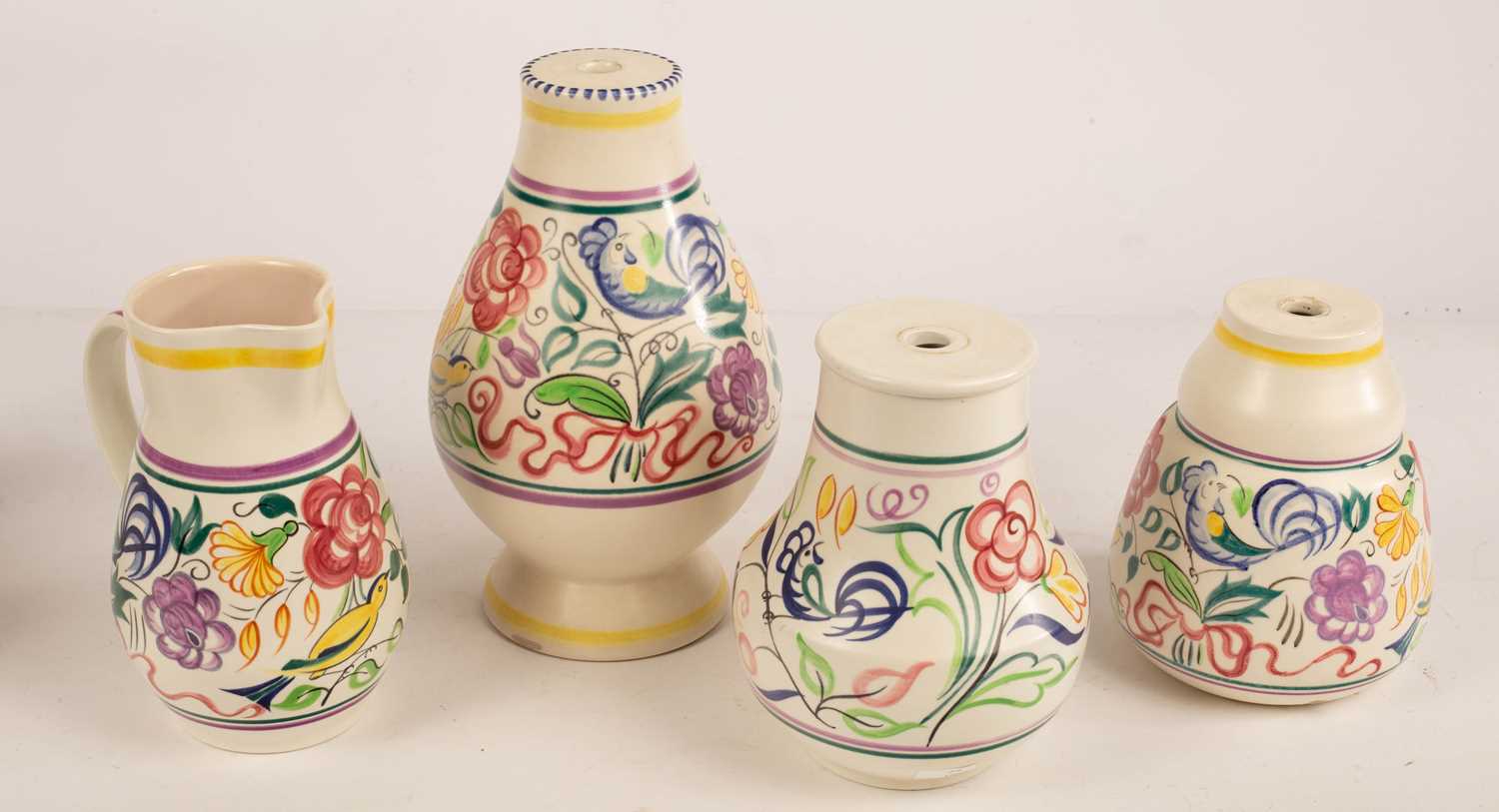 Lot 358 - Poole Pottery, three floral lamp bases, the