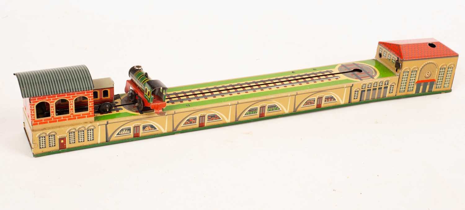 Lot 468 - A push pull clockwork train and carriage