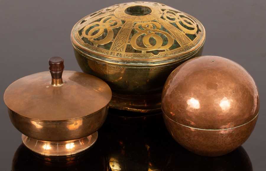 Lot 379 - A spherical copper string box, etched