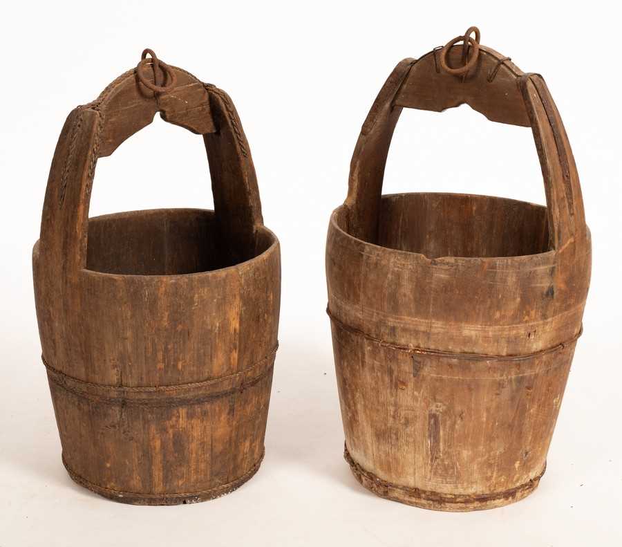 Lot 500 - Two wooden pails, the larger 63cm high