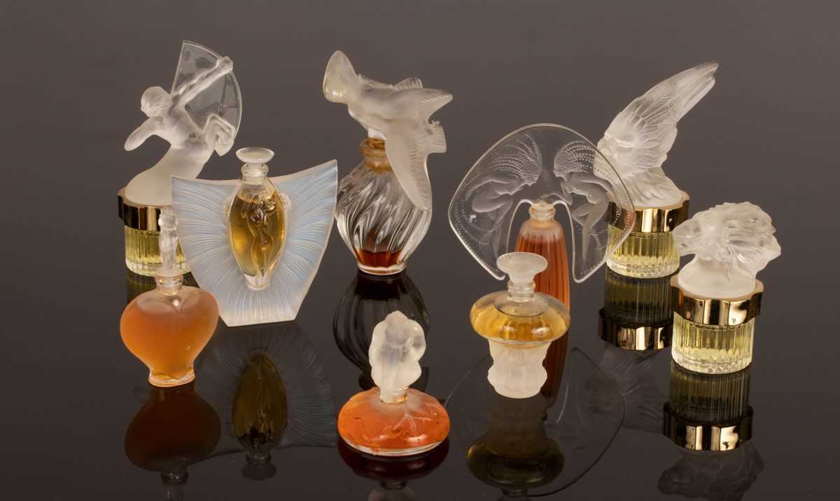 Lot 14 - Nine miniature perfume bottles designed by
