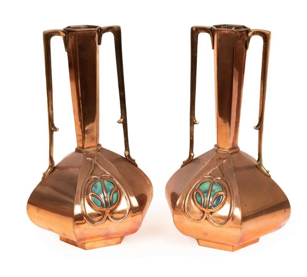 Lot 391 - A pair of Arts & Crafts copper vases with