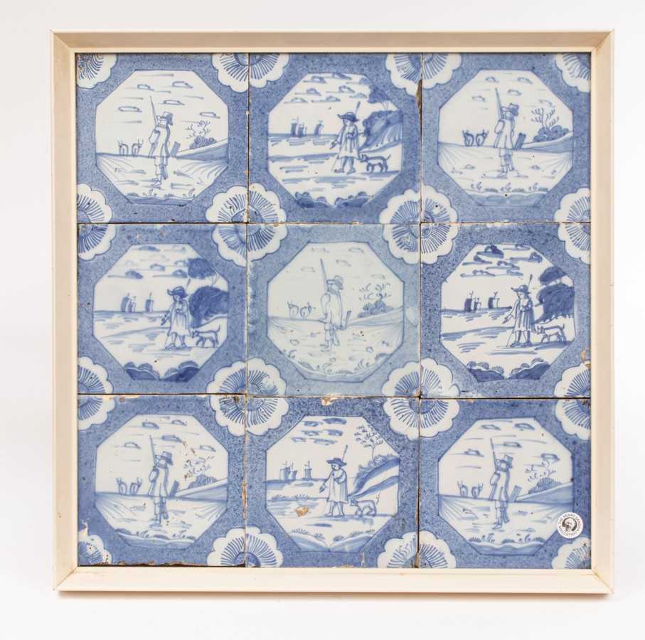 Lot 70 - A frame of nine English Delftware tiles,