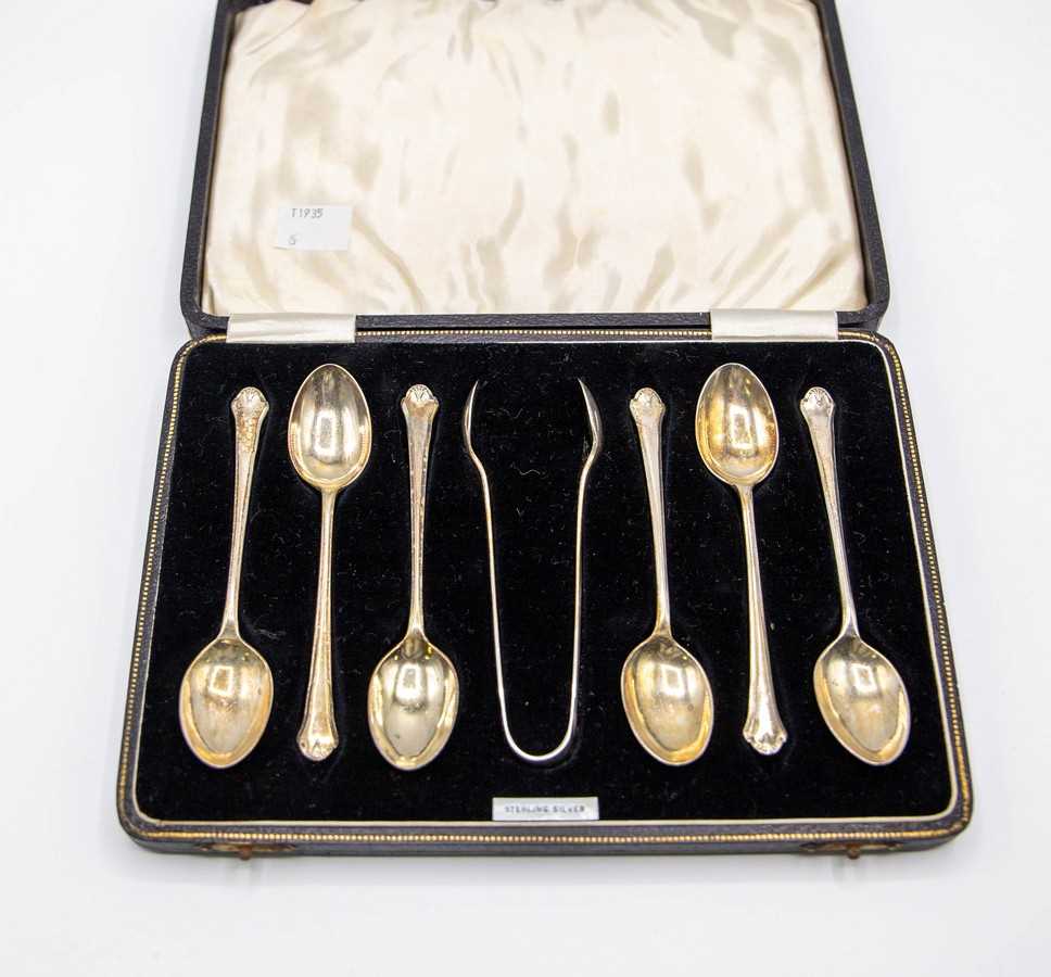 Lot 79 - Six silver coffee spoons and matching tongs,