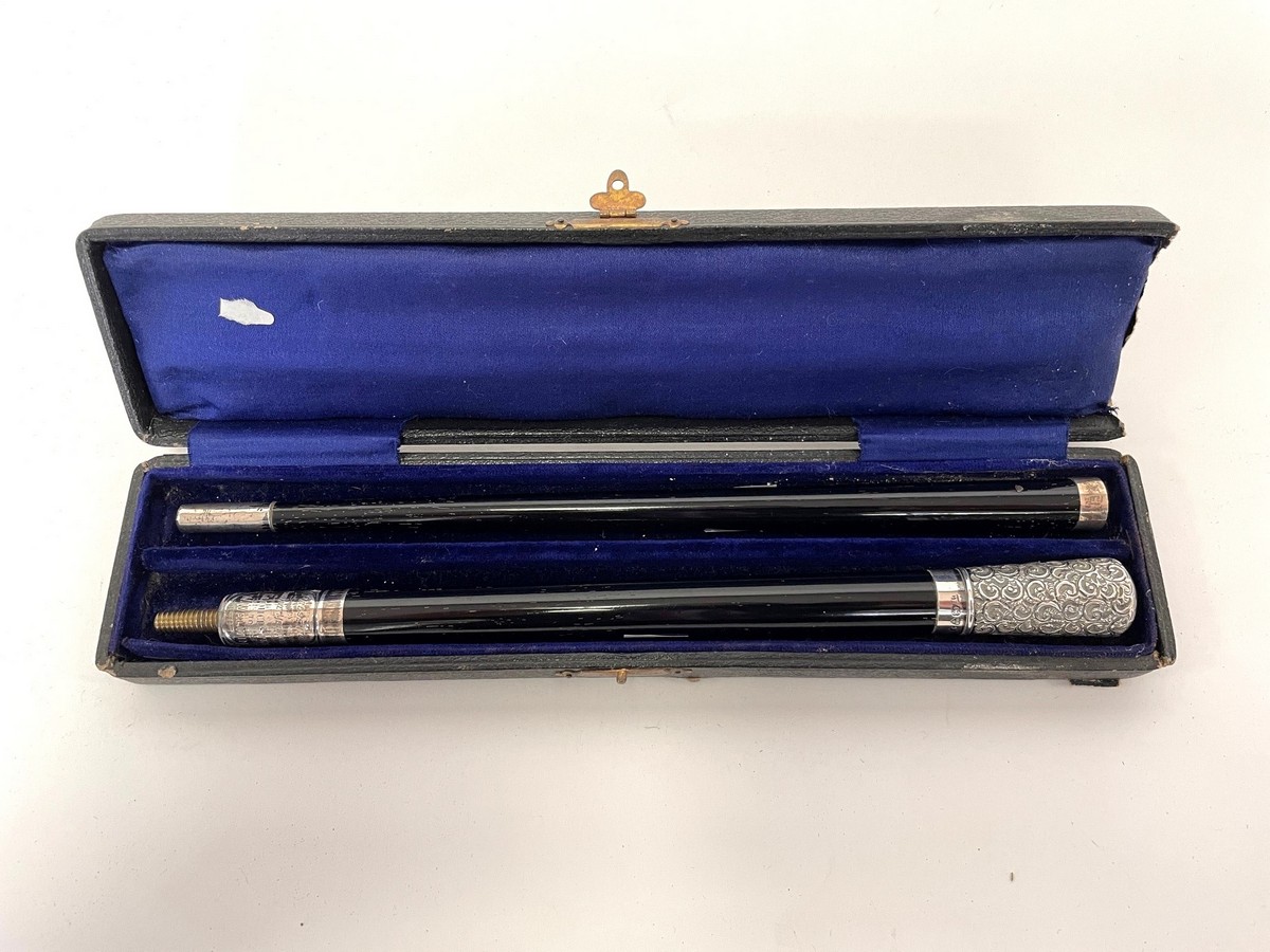Lot 148 - A cased silver mounted presentation baton,