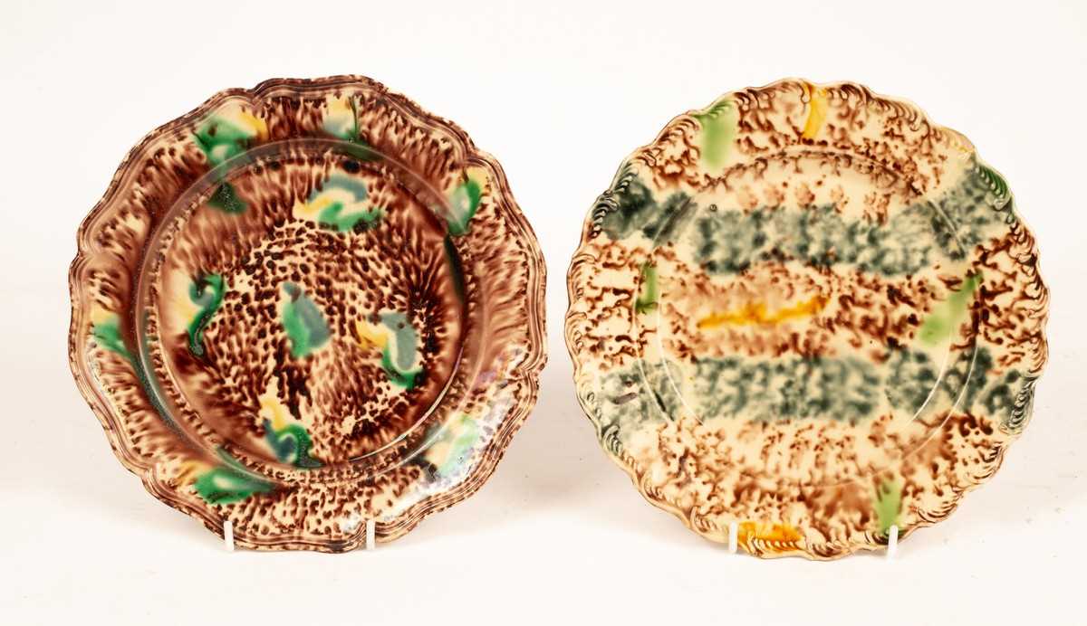 Lot 512 - An English creamware Whieldon type plate,