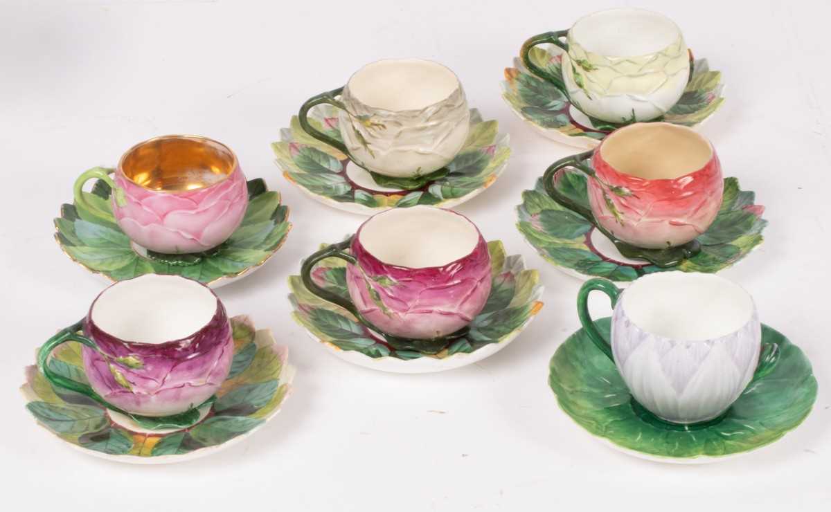 Lot 264 - A set of five Minton rose-form cups and