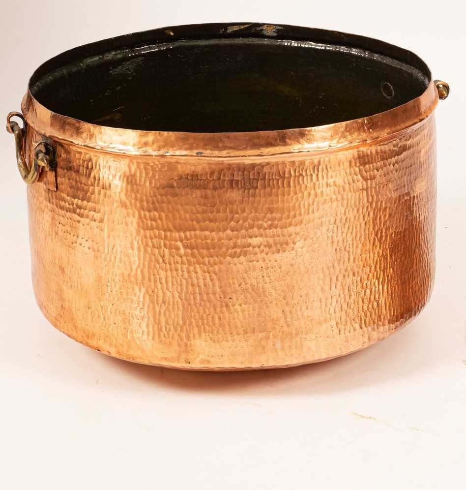 Lot 297 - A large Middle Eastern copper two-handled