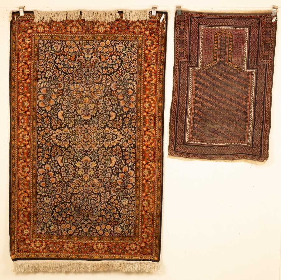 Lot 700 - An Indian millefleur rug, 20th Century,