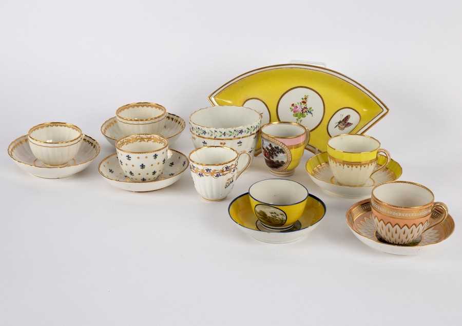 Lot 254 - A group of English porcelain teaware, circa
