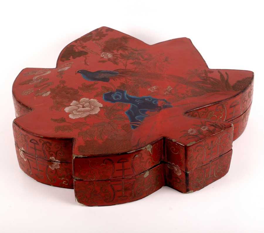 Lot 387 - A Japanese lacquered leaf shaped box, the
