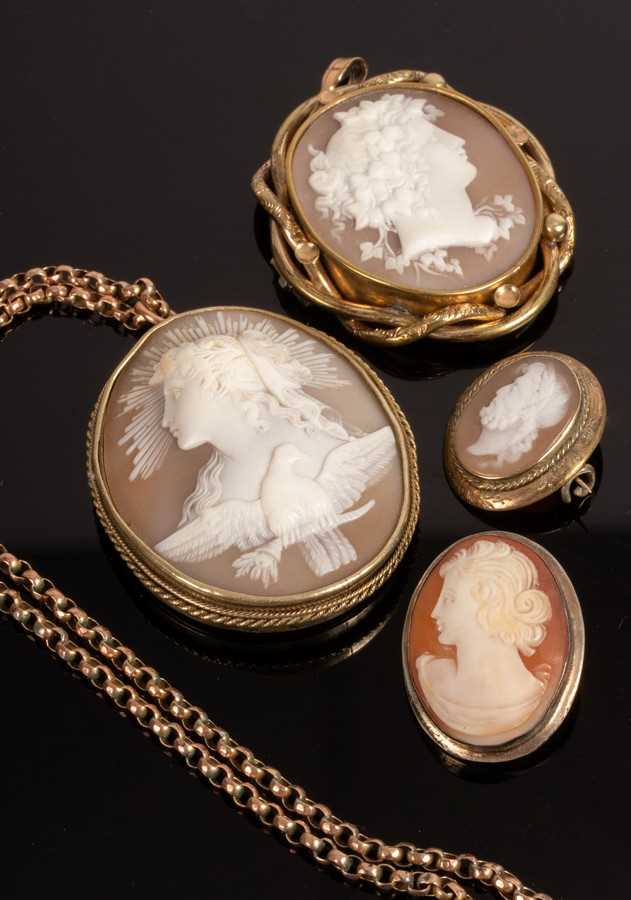 Lot 202 - Four shell cameos, one depicting peace