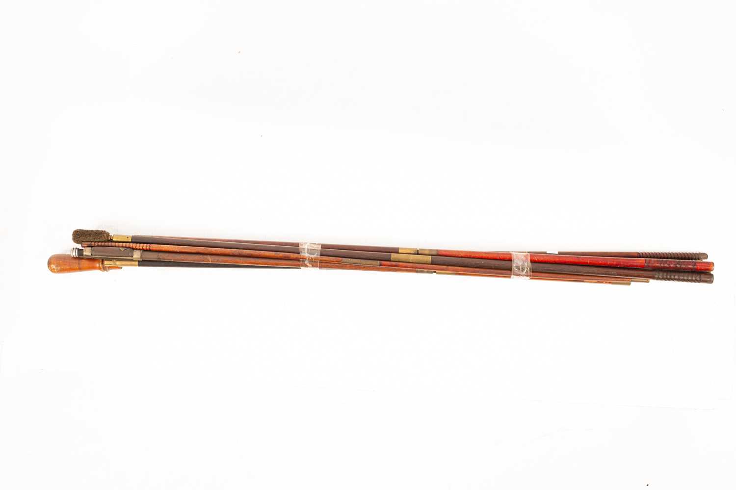 Lot 220 - Eight turned wood, brass mounted gun rods