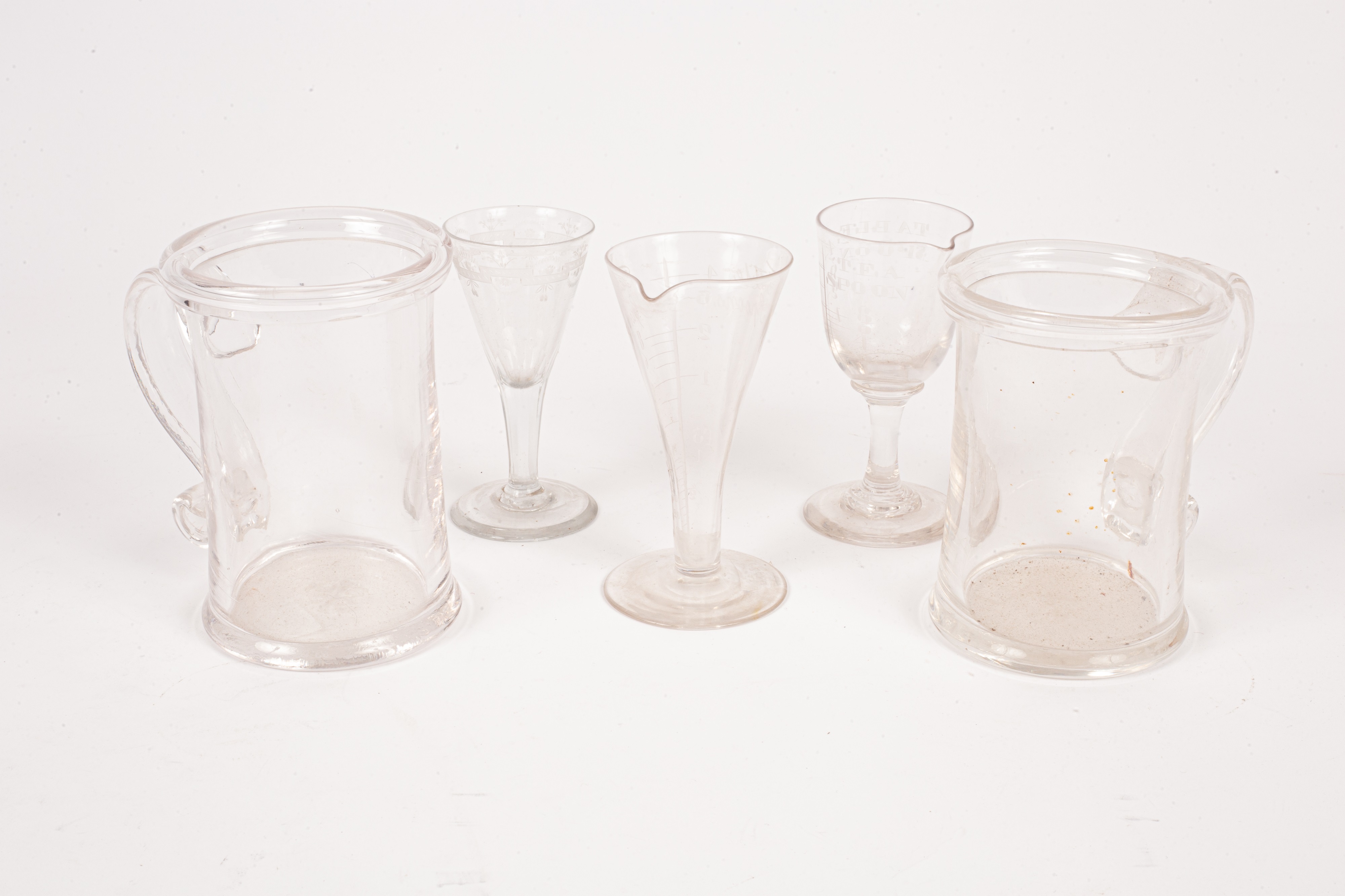 Lot 163 - Two 18th Century glass tankards