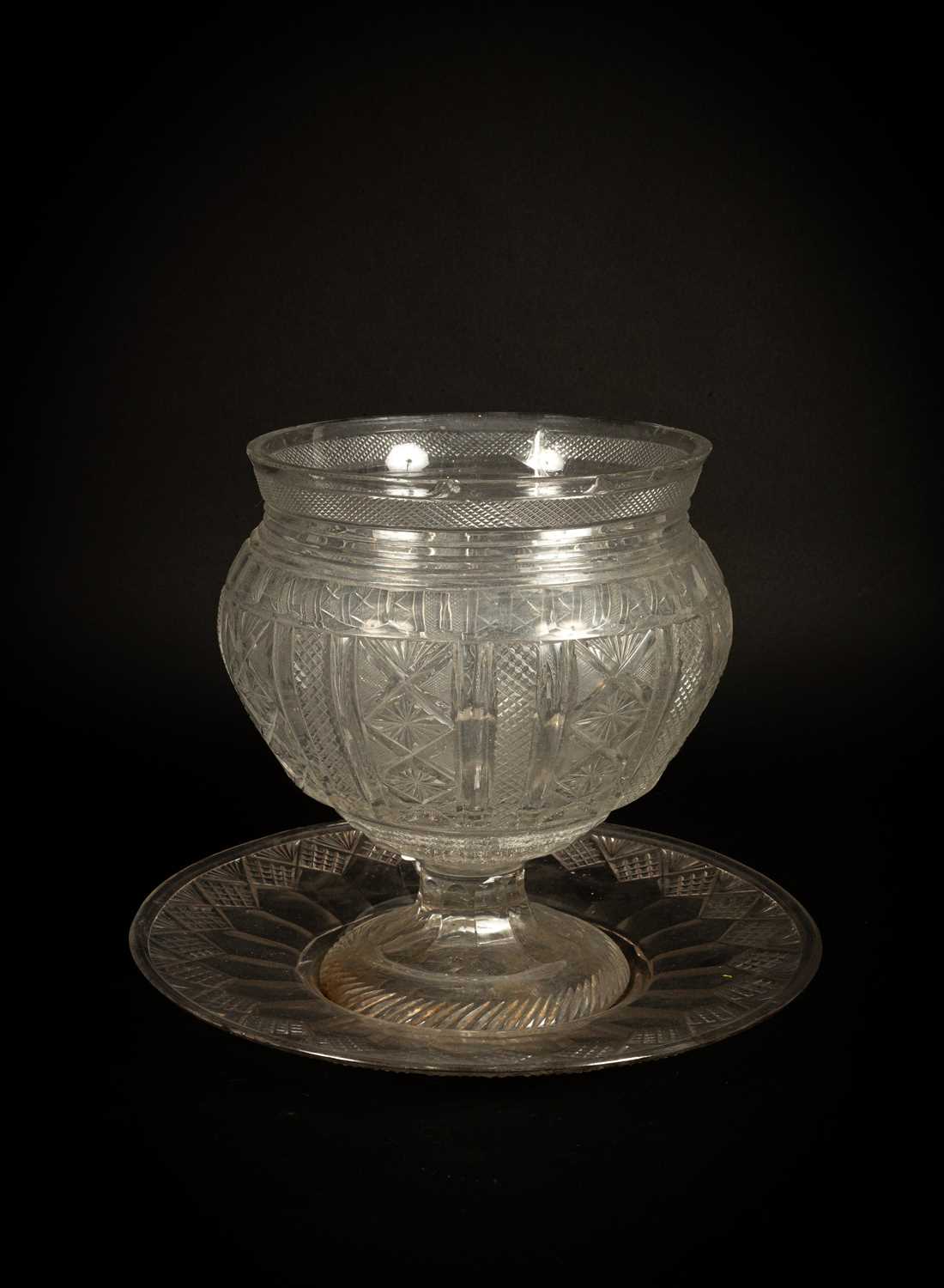 Lot 297 - A large cut glass footed bowl and stand